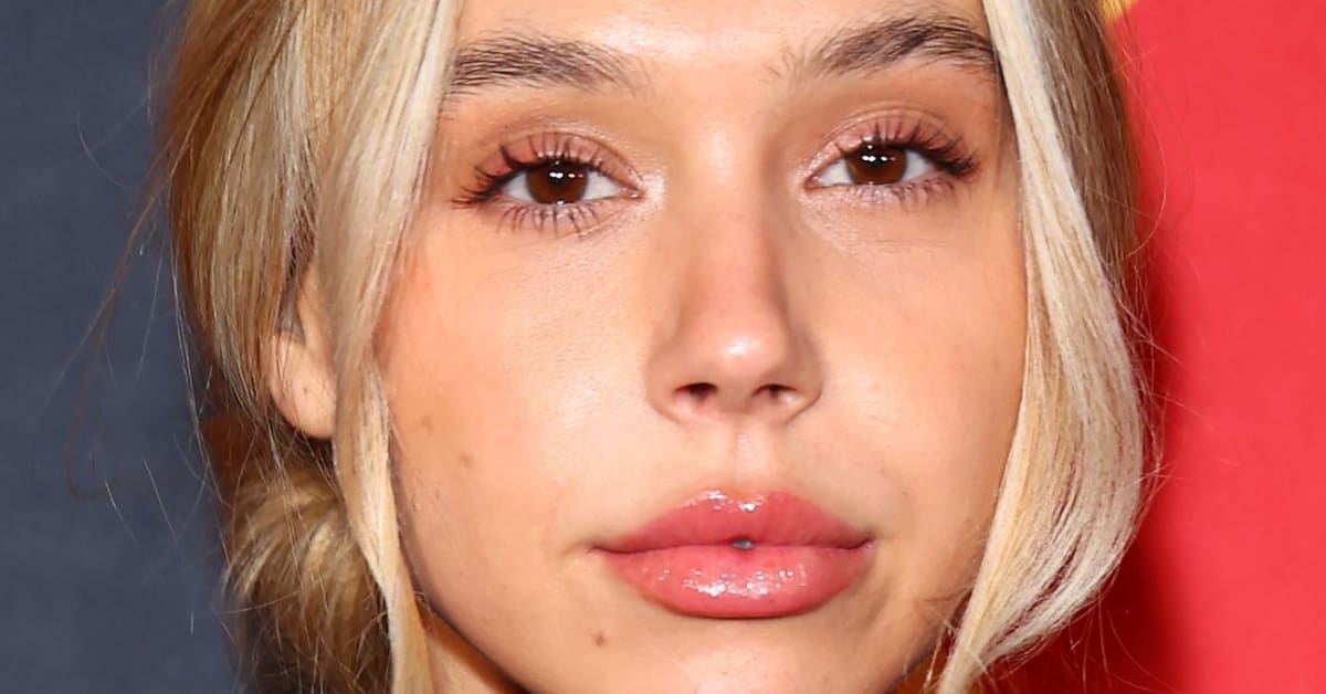 Alexis Ren Goes Full Cowgirl in Cropped Leather Top, Chaps and Western Hat - Sports Illustrated ...