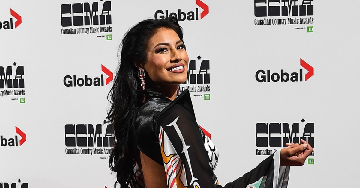 Swim Search Model Ashley Callingbull Poses Poolside in Printed One ...