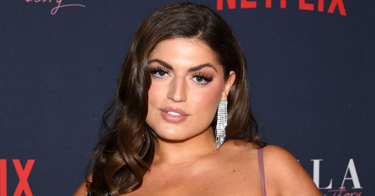 SI Swim Search Model Gabriella Halikas Slays in Lace Velvet Maxi Dress ...